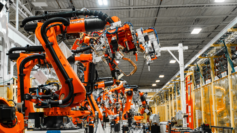 Large assembly line for battery electric vehicle | KUKA