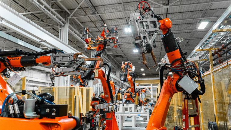Large assembly line for battery electric vehicle | KUKA AG