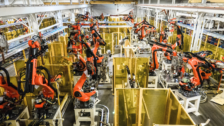 Large assembly line for battery electric vehicle | KUKA AG