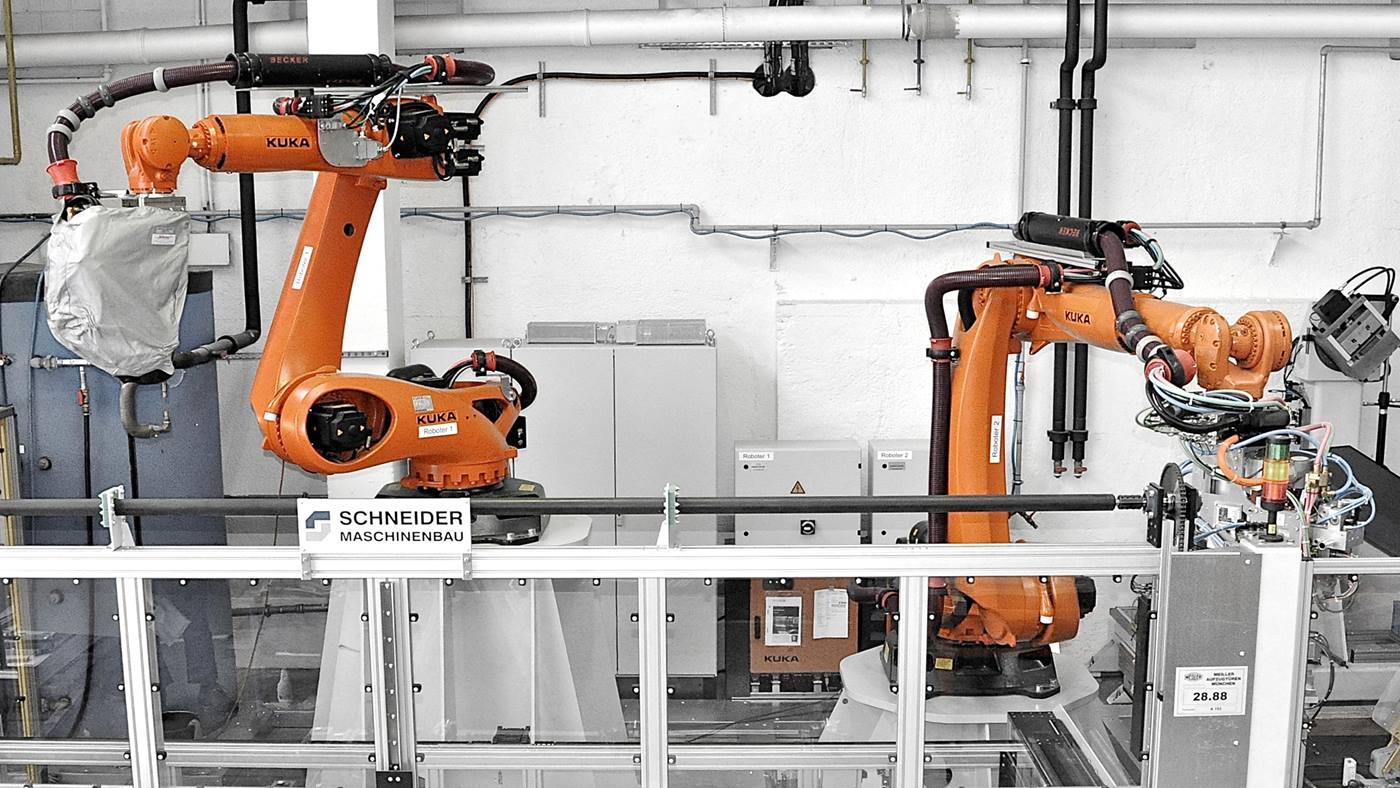 Robots supporting assembly of elevator doors | KUKA Germany
