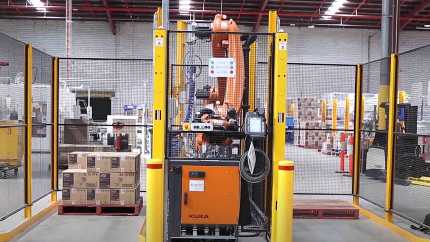 KUKA palletizing robot stacks boxes on an assembly line | KUKA AG