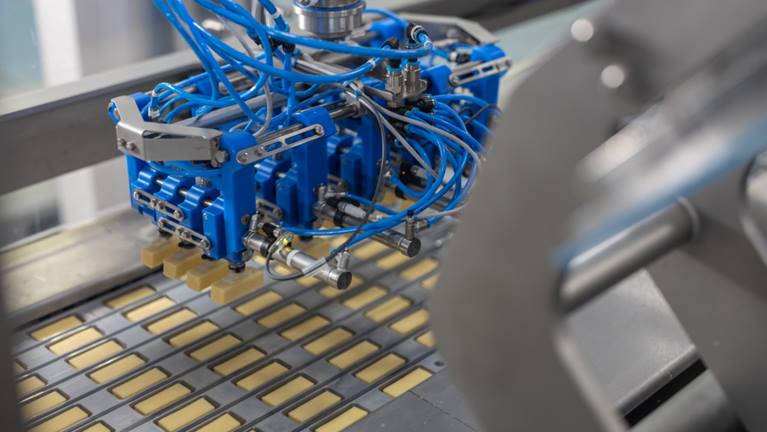 Automated cheese processing | KUKA