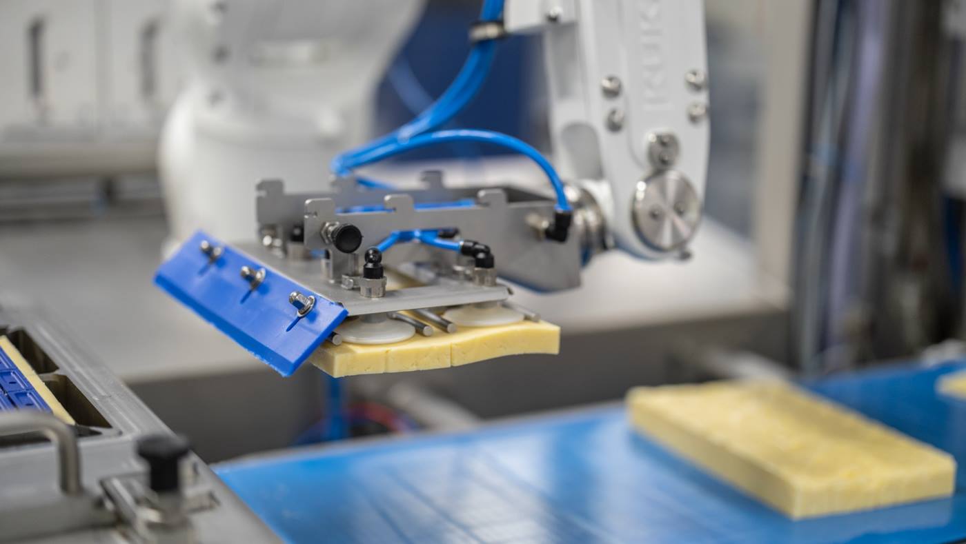 Automated cheese processing | KUKA