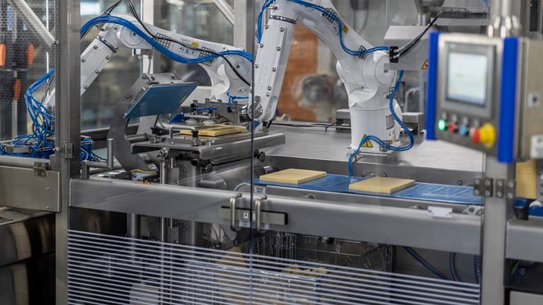 Automated cheese processing | KUKA
